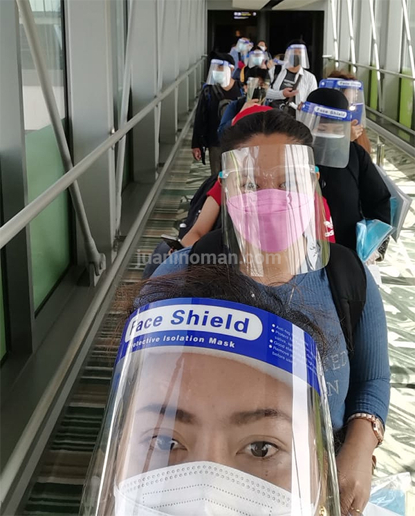 In Photos: PH Government-funded repatriation flight from Oman